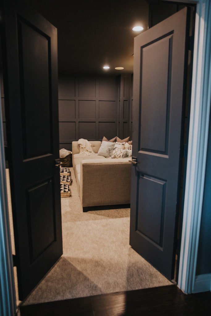 Our Dark Gray Home Theater Room with Wall Paneling - Merrick's Art